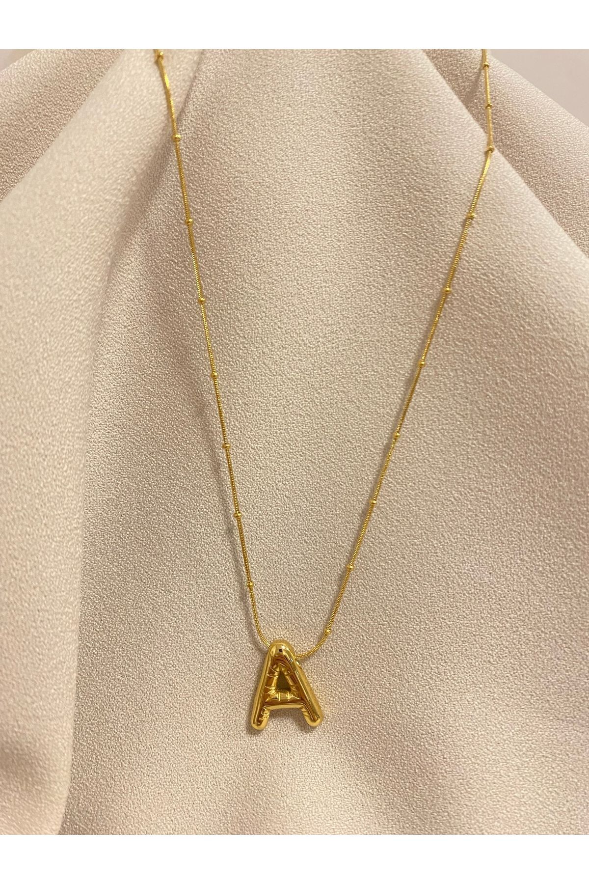 Özlemin takı tezgahı Balon harf kolye A harfi Çelik gold renk Fiyatı ...