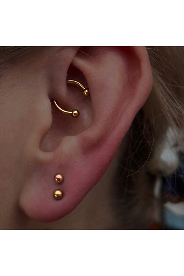 triple tragus piercing